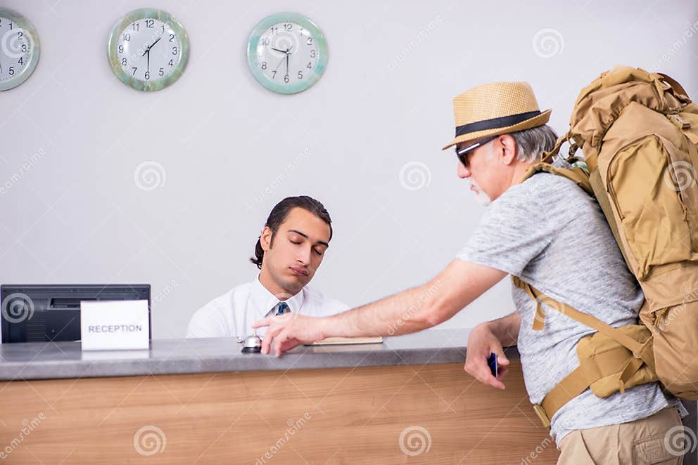 Backpacker at the Hotel Reception Stock Photo - Image of desk, arrival ...