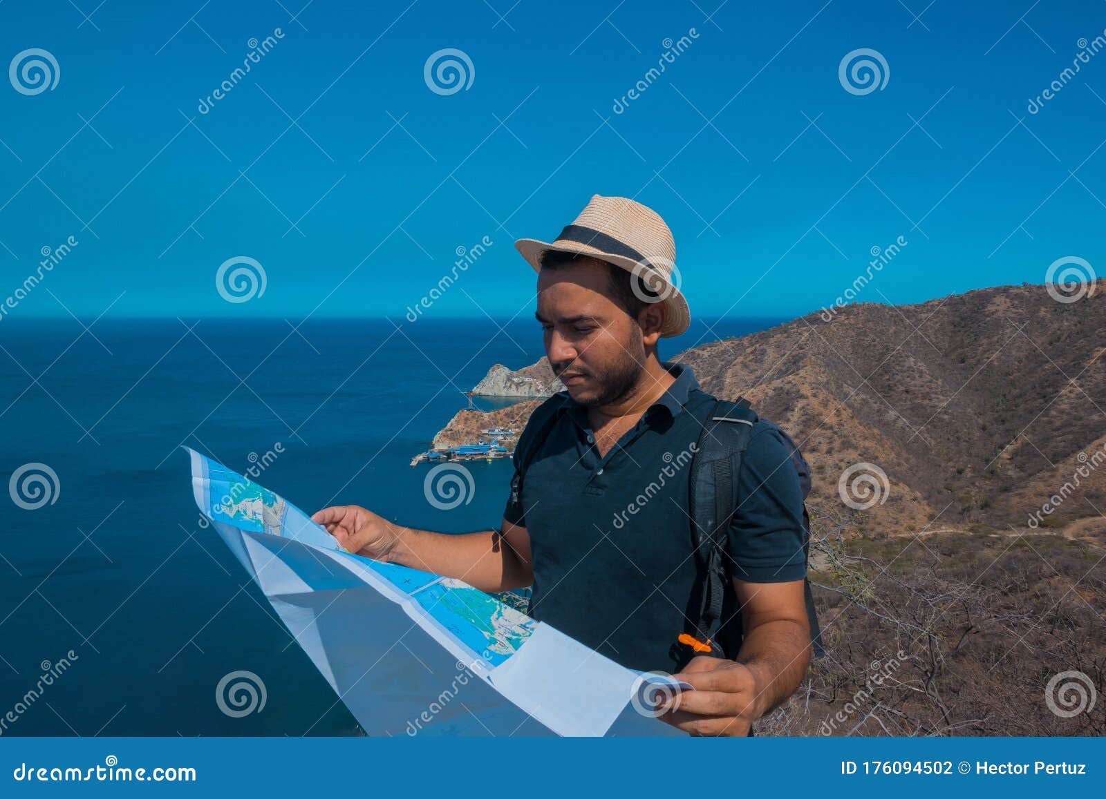 Backpacker Lost in the Mountains Using a Map Stock Photo - Image of ...