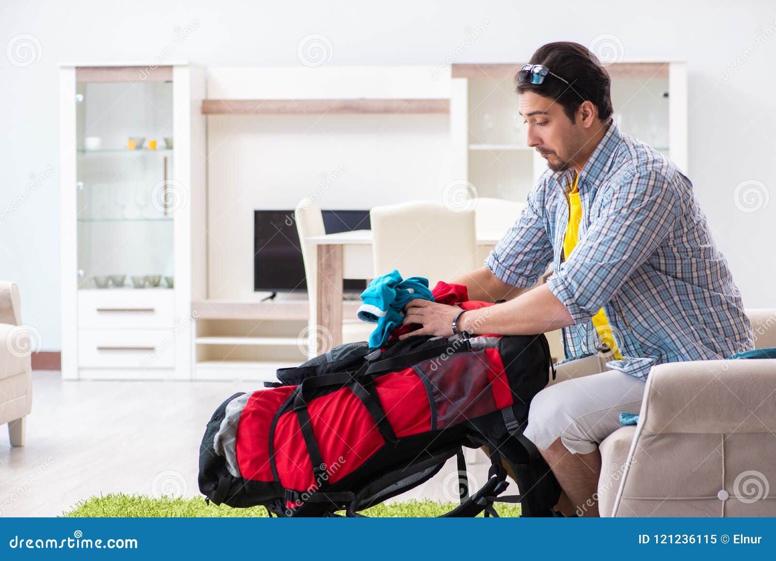 The Backpacker Packing for His Trip Stock Image - Image of explorer ...