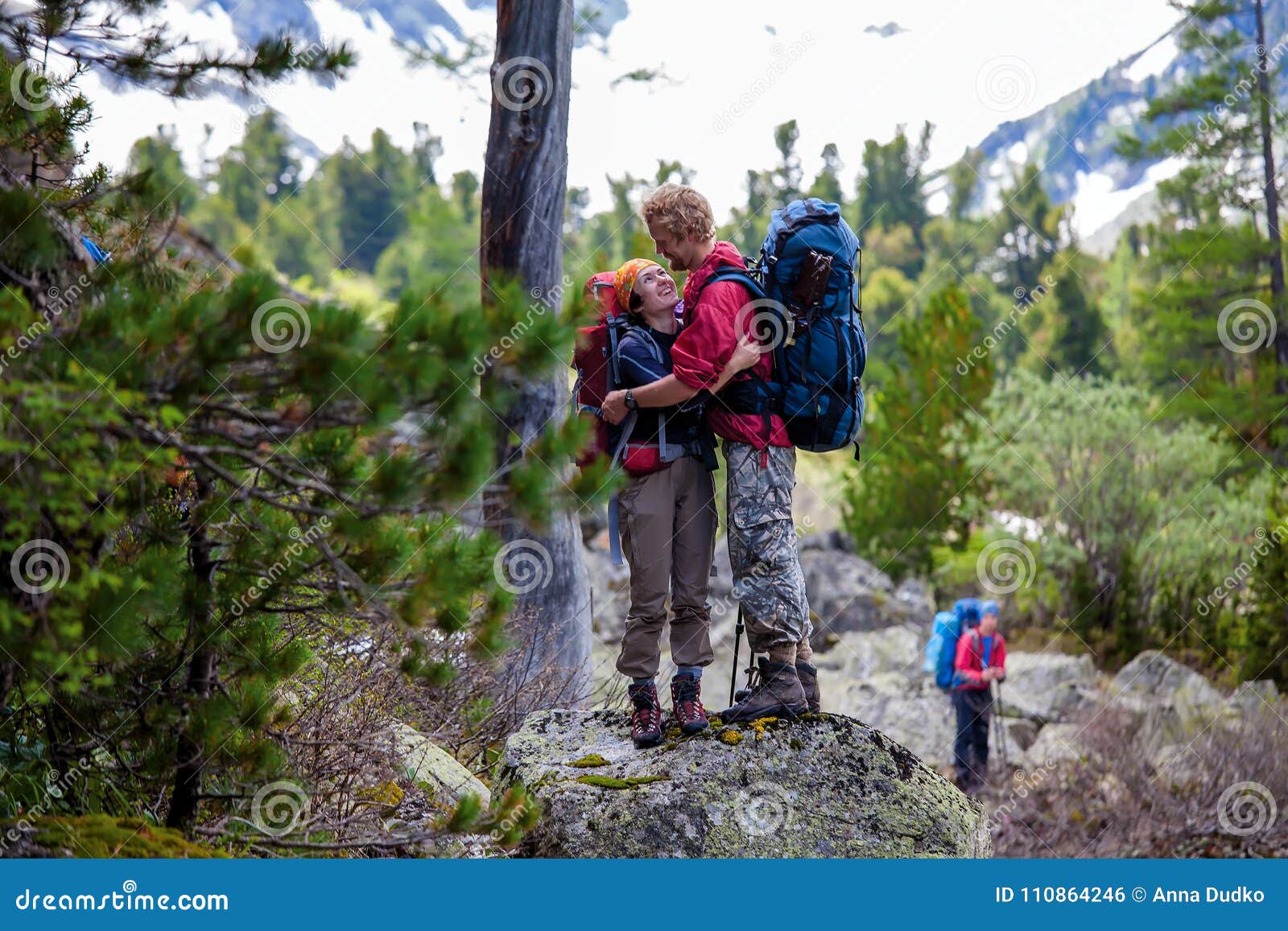 Backpacker is Resting while Hiking in Mountains Stock Photo - Image of ...
