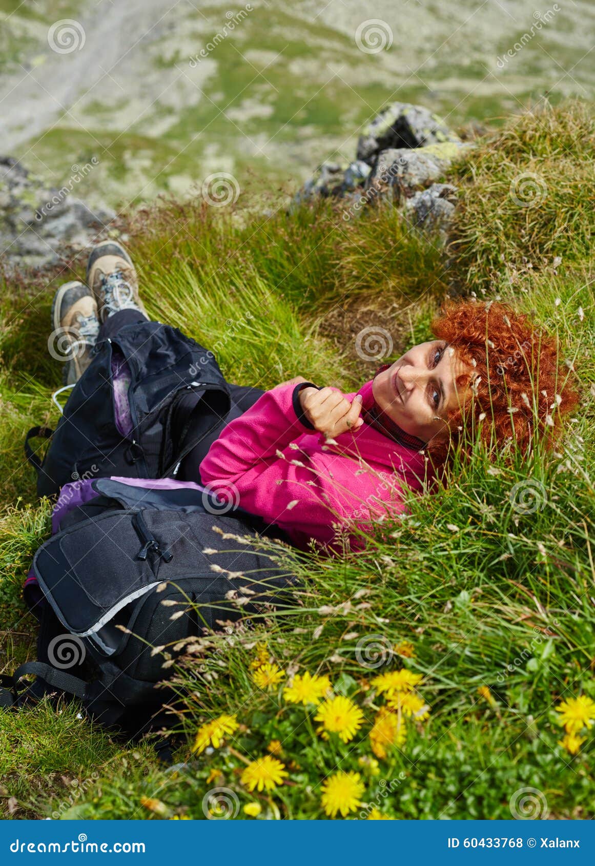 Backpacker Resting on Mountain Trail Stock Photo - Image of girl, curly ...