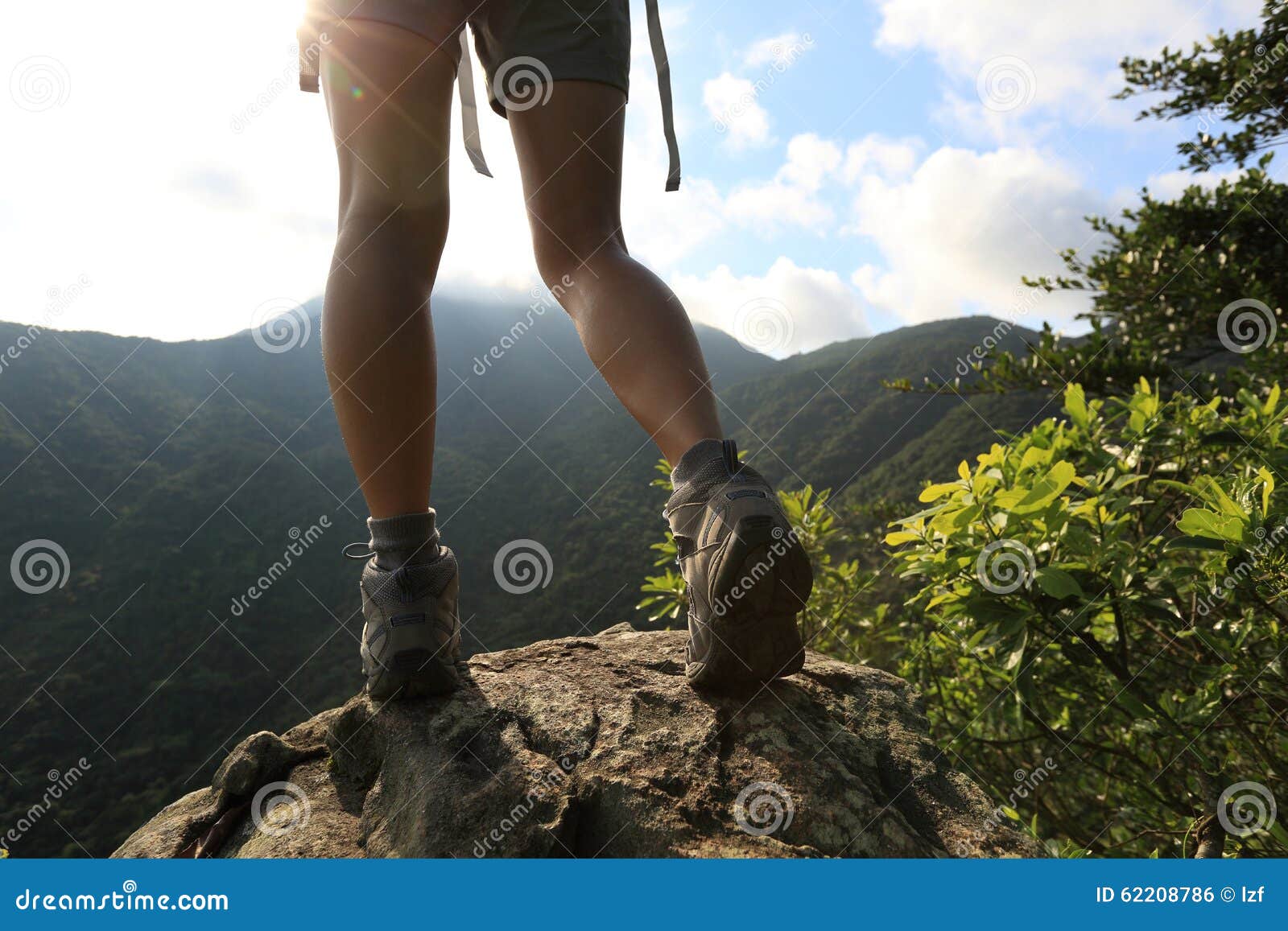 Backpacker on Sunrise Mountain Peak Rock Stock Photo - Image of legs ...