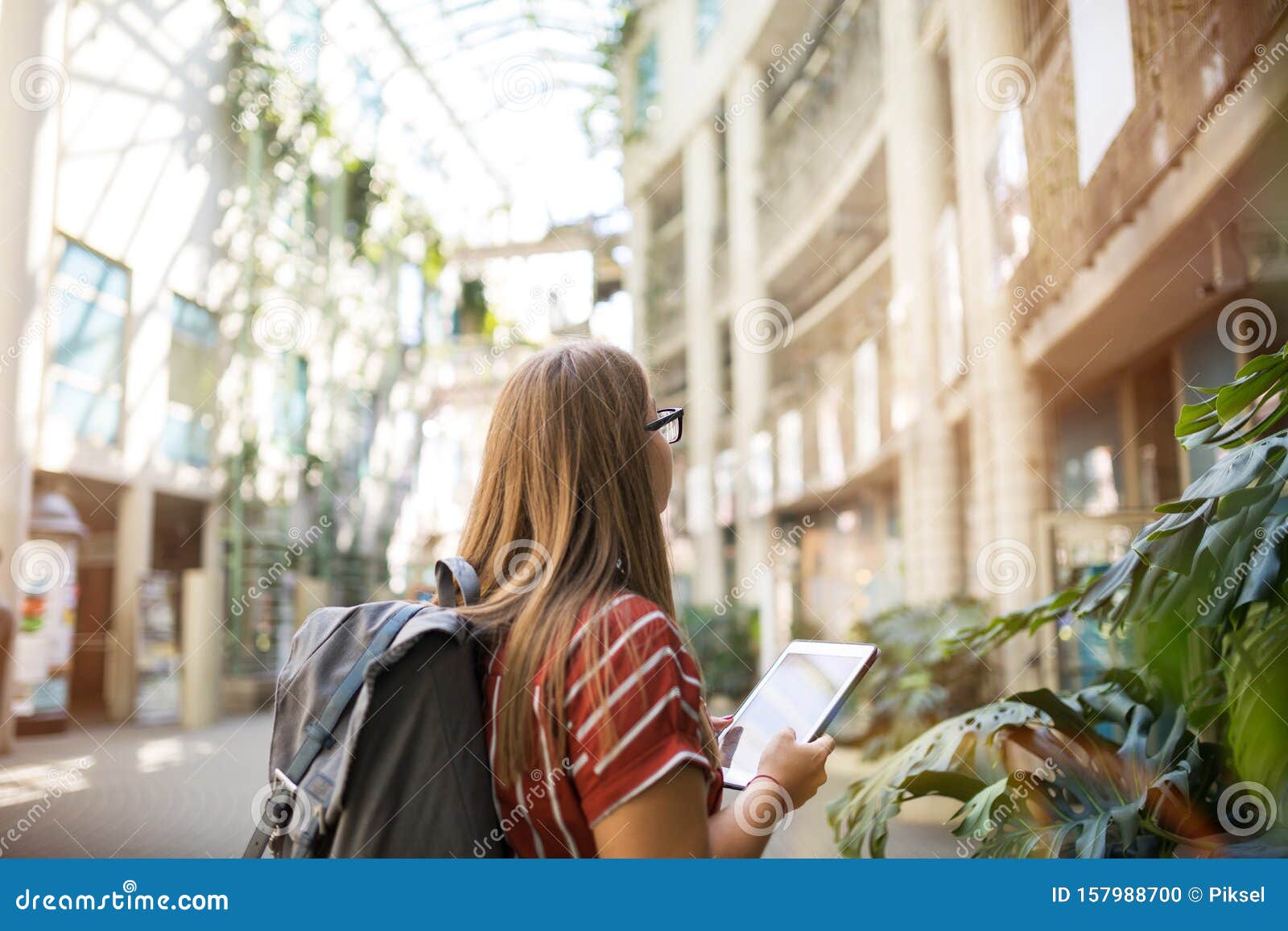 Young Woman Walking in the City and Using Tablet Pc Stock Photo - Image ...
