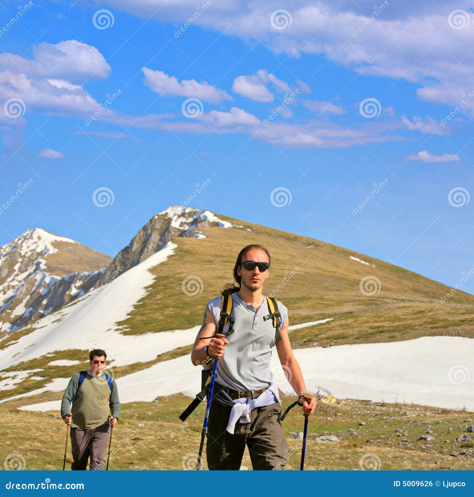 Backpackers on a mountain stock photo. Image of mountaineer - 5009626