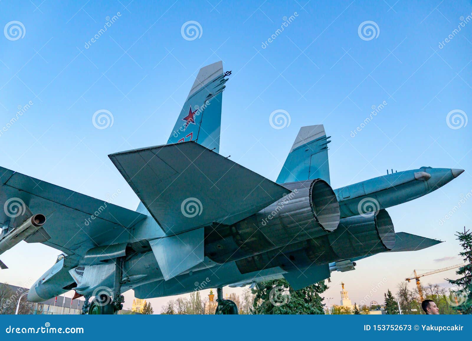 Backside and Tail of the Russian Fighter Against the Blue Sky Editorial ...