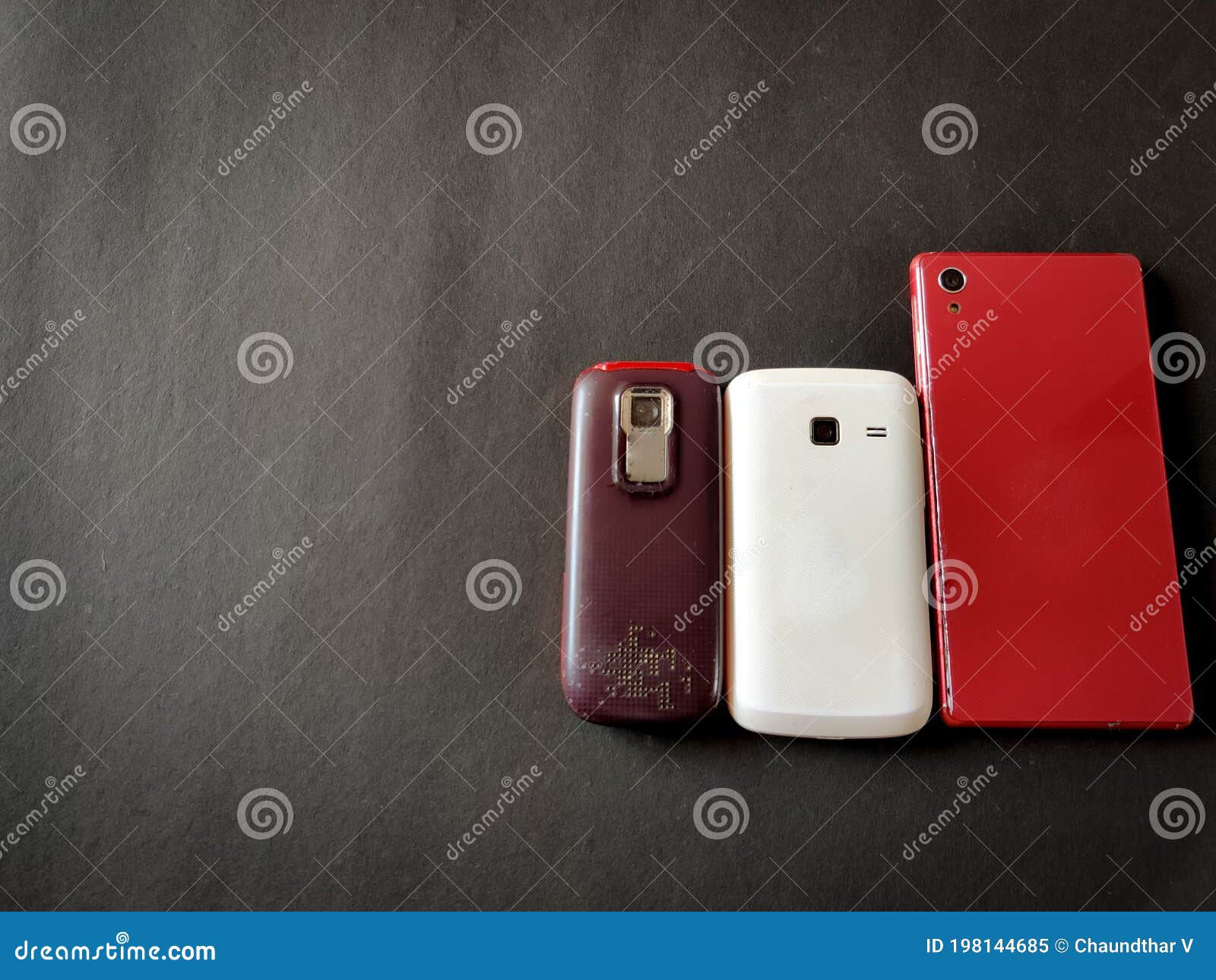 Backside of Three Mobile Phones Stock Image - Image of connection ...