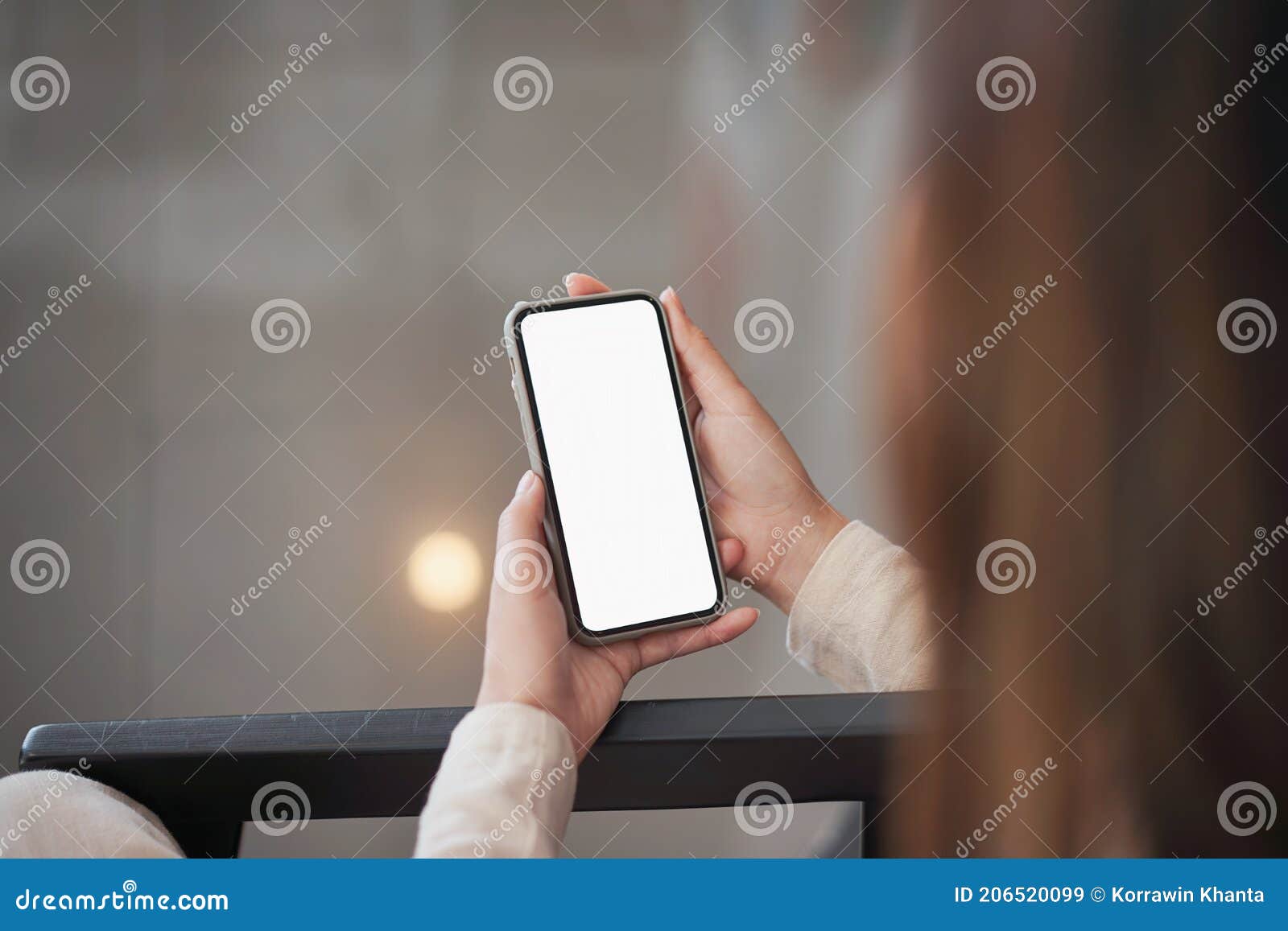 Backside View of Woman Hand Using Mockup White Screen Mobile Phone ...