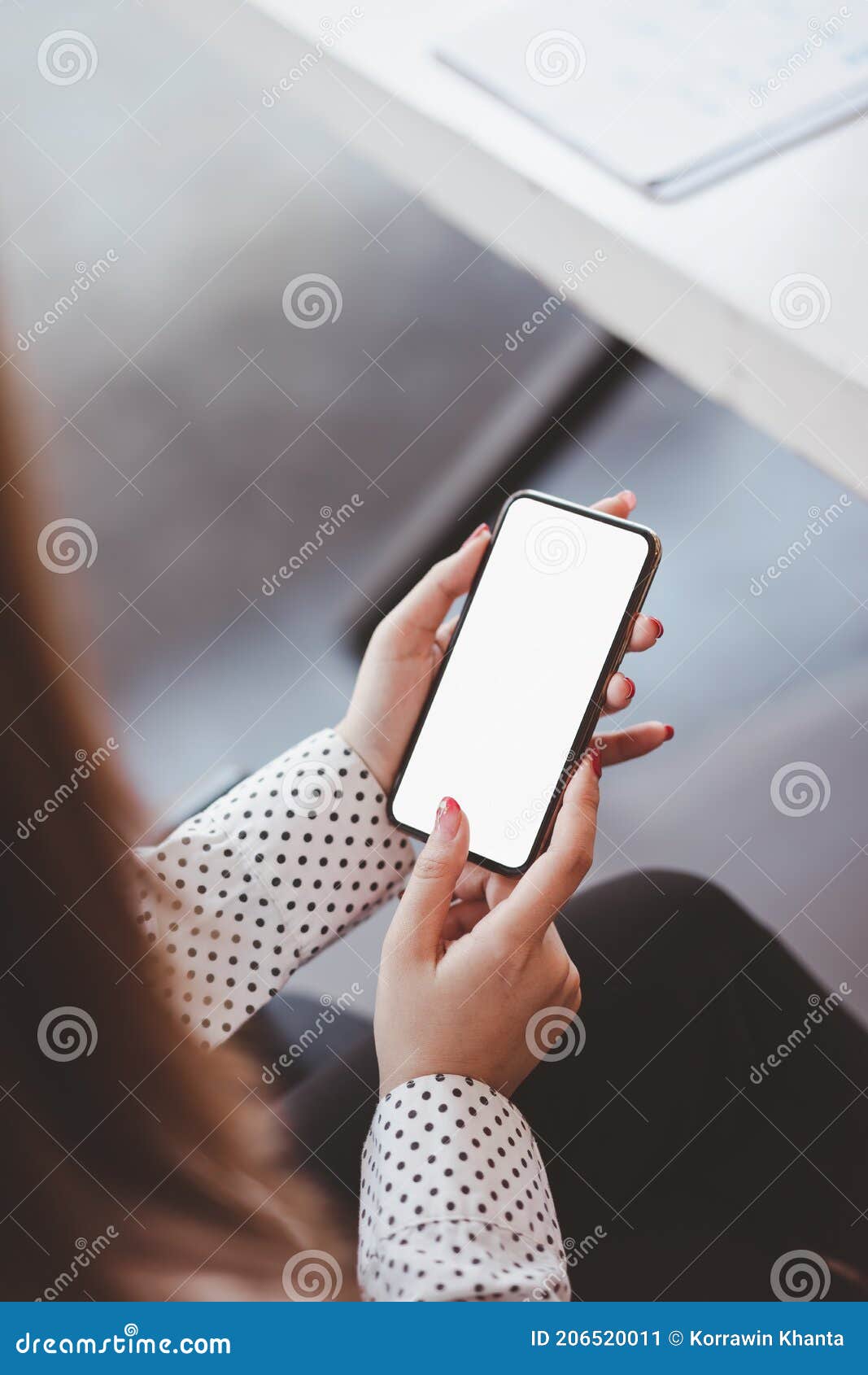 Backside View of Woman Hand Using Mockup White Screen Mobile Phone ...