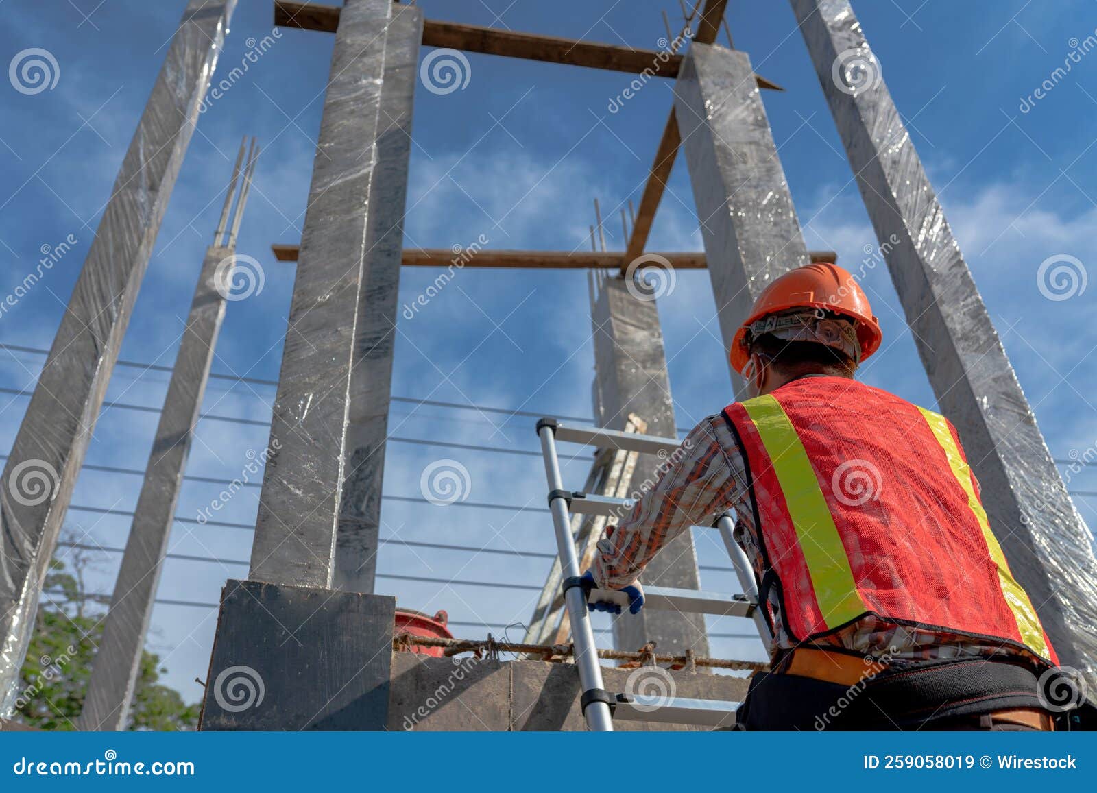 Backside Worker in Uniform at the Construction Site Stock Image - Image ...
