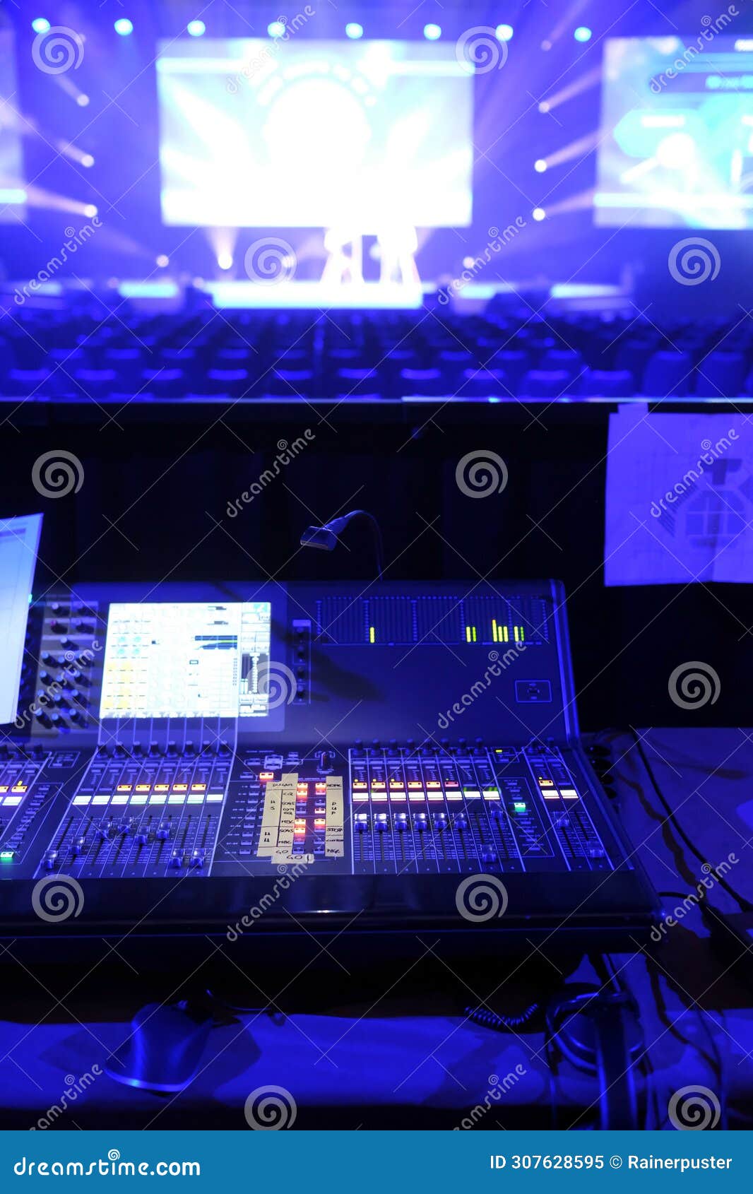 Backstage Area in a Convention with Technical Staff Handling Light ...