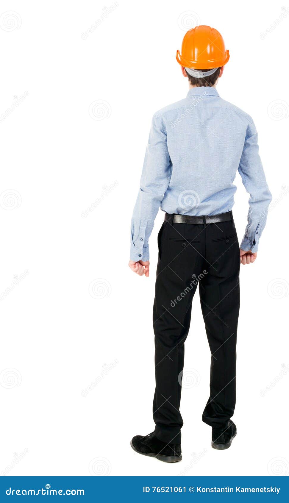 Backview of an Engineer in Construction Helmet Stands. Stock Image ...