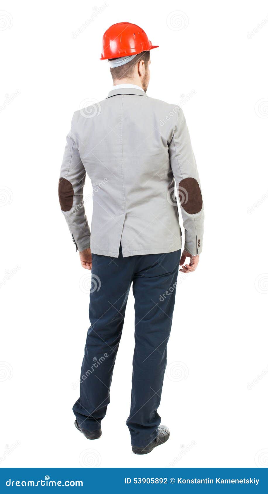 Backview of an Engineer in Construction Helmet Stands Stock Photo ...