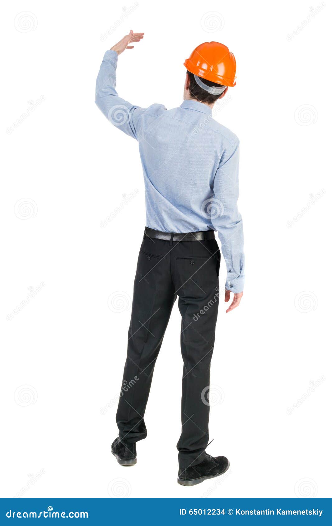 Backview of an Engineer in Construction Helmet Stands. Standing Stock ...