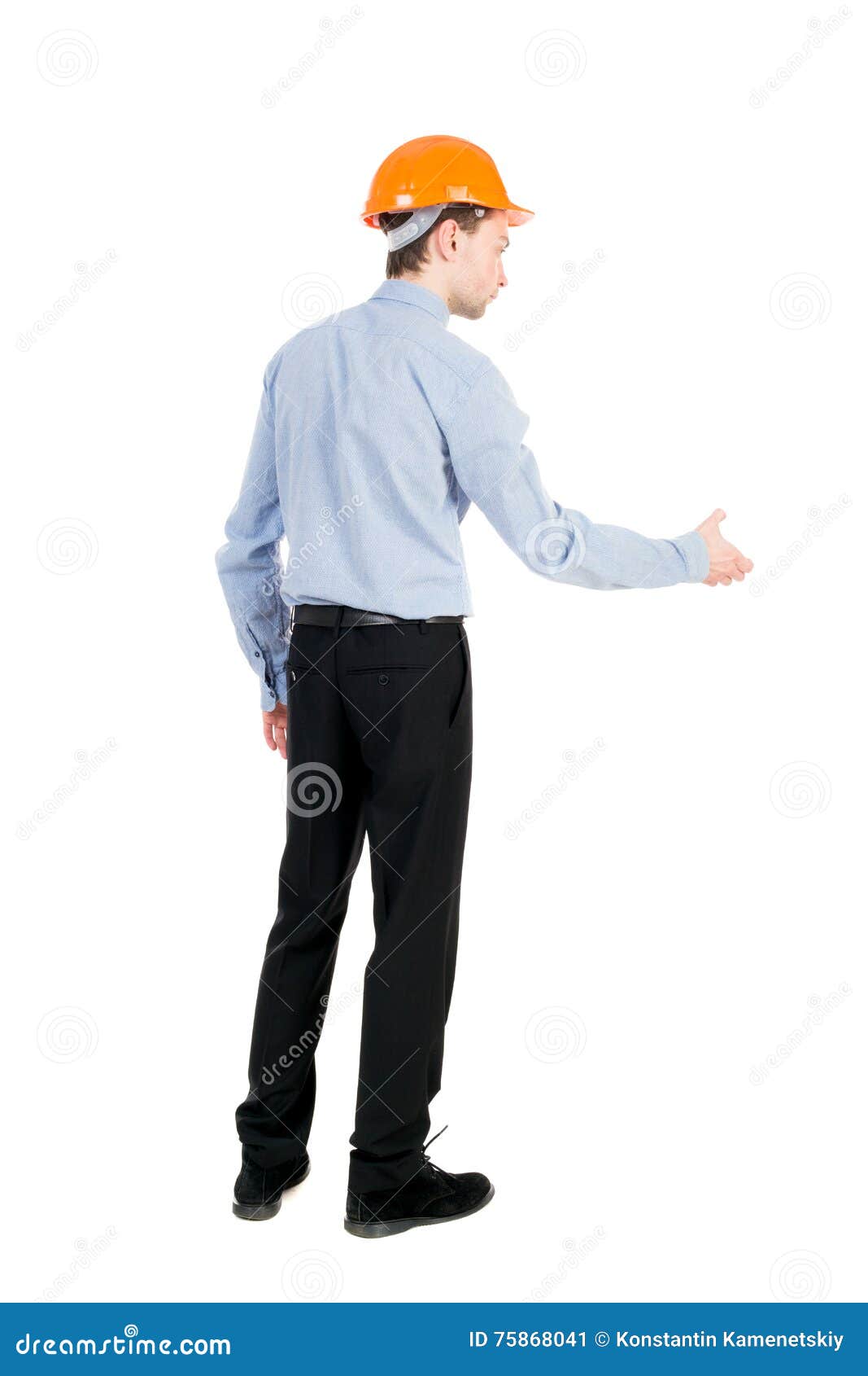 Backview of an Engineer in Construction Helmet Stands. Stock Image ...