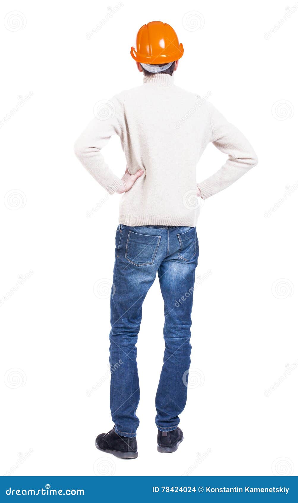 Backview of an Engineer in Construction Helmet Stands. Standing Stock ...