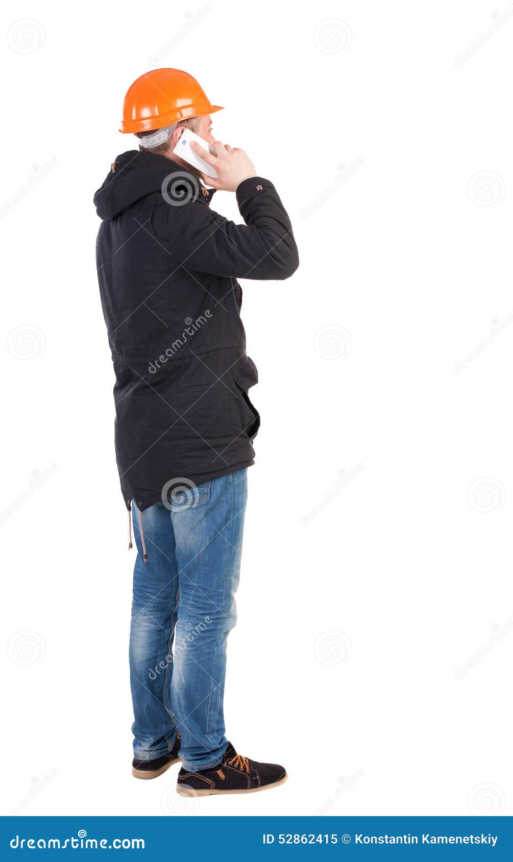 Backview Of An Engineer In Construction Helmet Stands. Royalty-Free ...