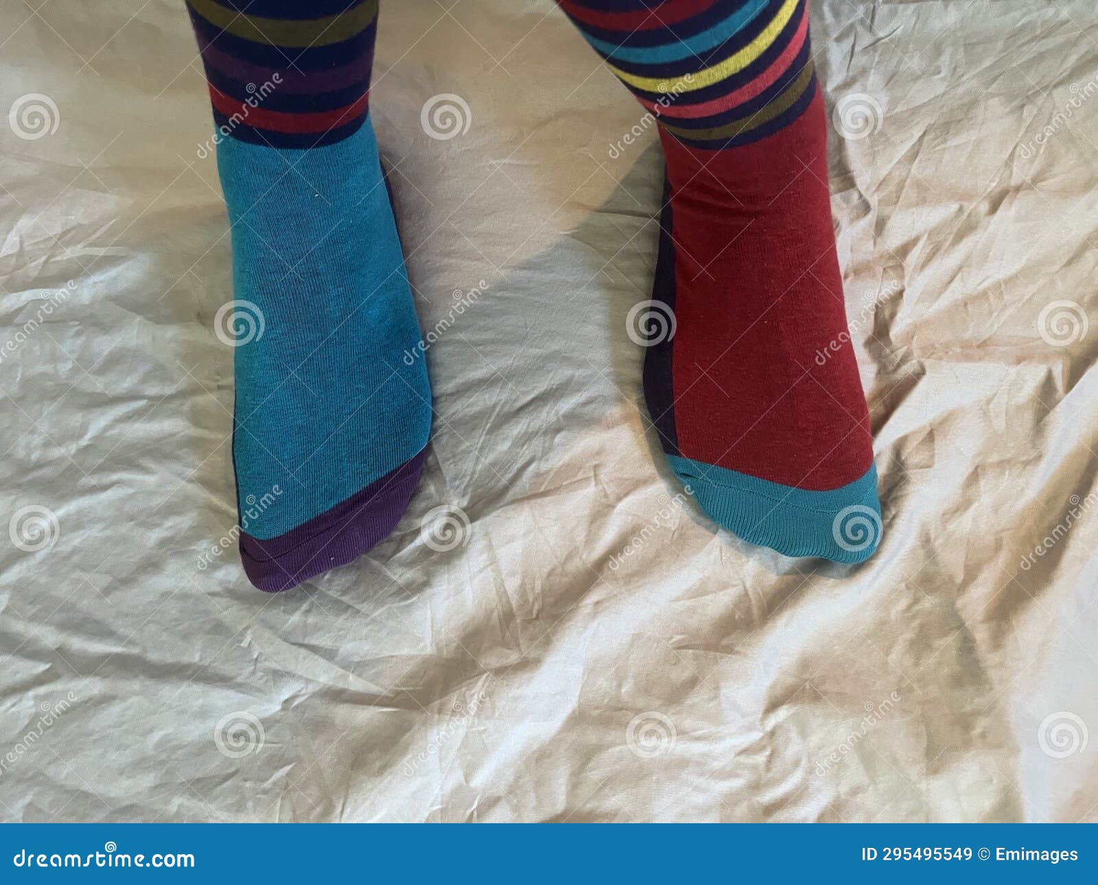 Backwards Feet Wearing Mismatched Socks Stock Image - Image of garment ...