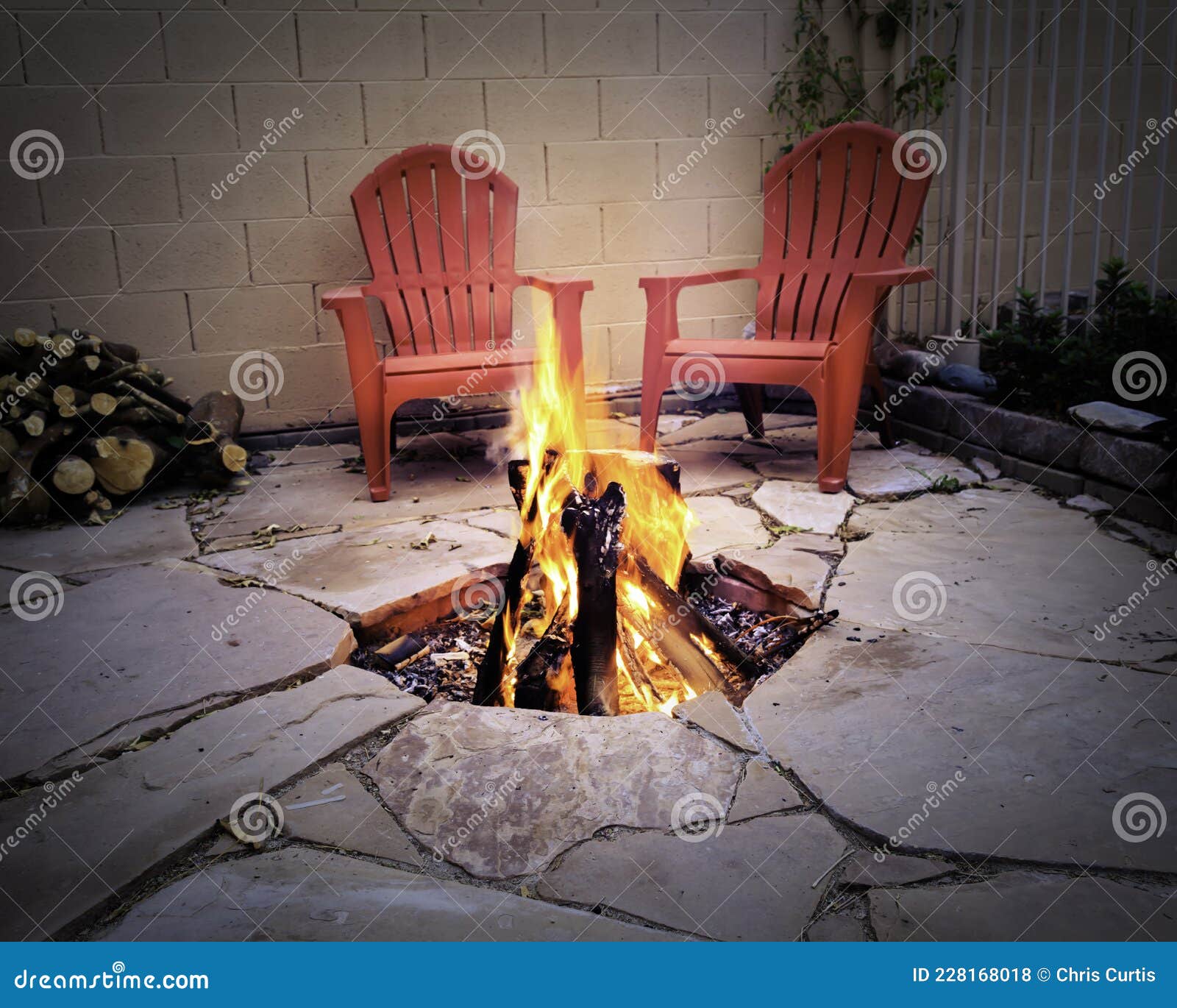 Backyard Bonfire and Chairs at Sunset Stock Photo - Image of fireplace ...