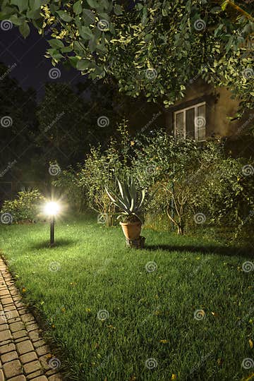 Backyard Garden Path at Night Stock Image - Image of hause, lamp: 76306041