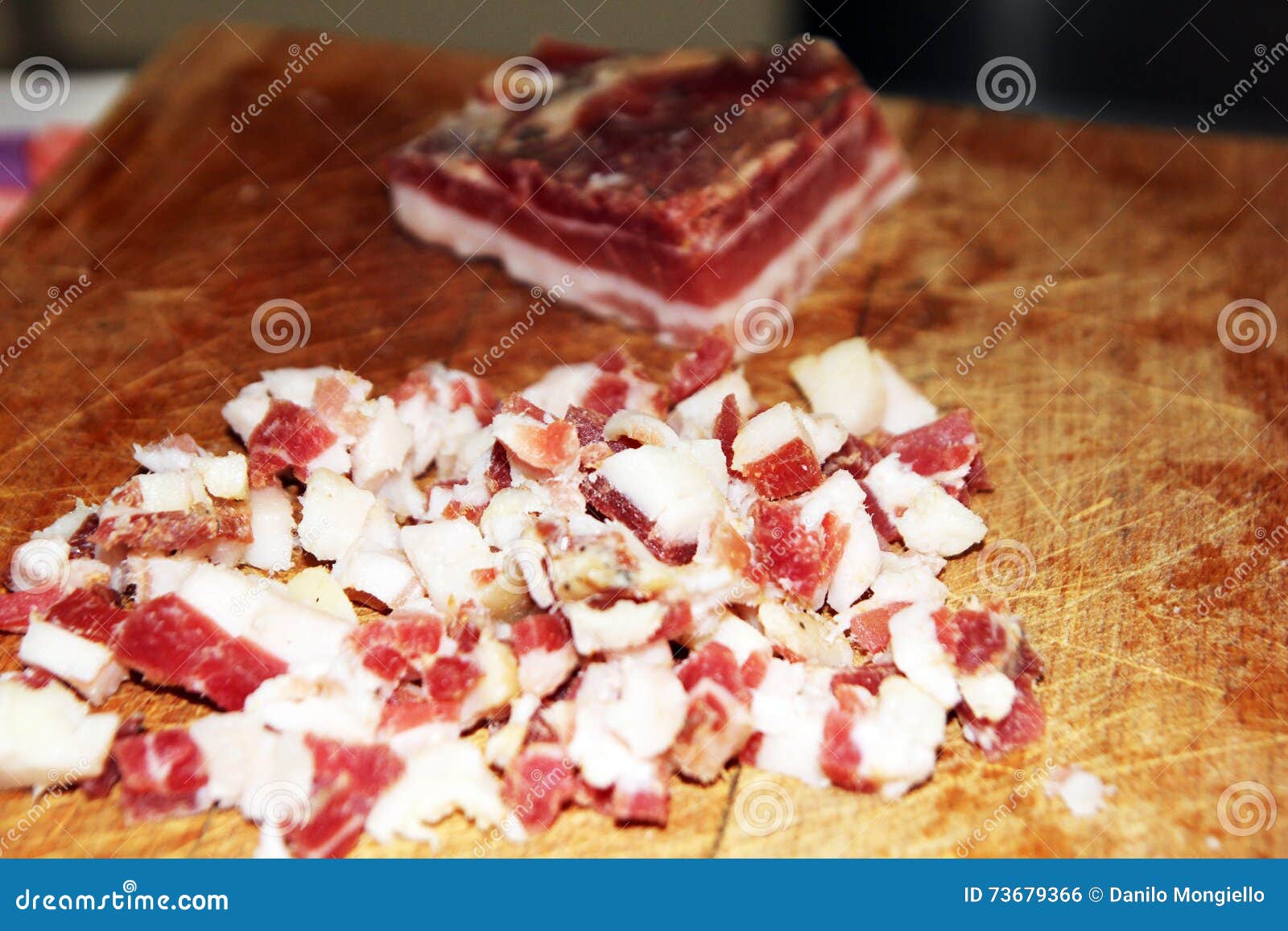 Bacon cubes stock photo. Image of cutting, hands, cube - 73679366