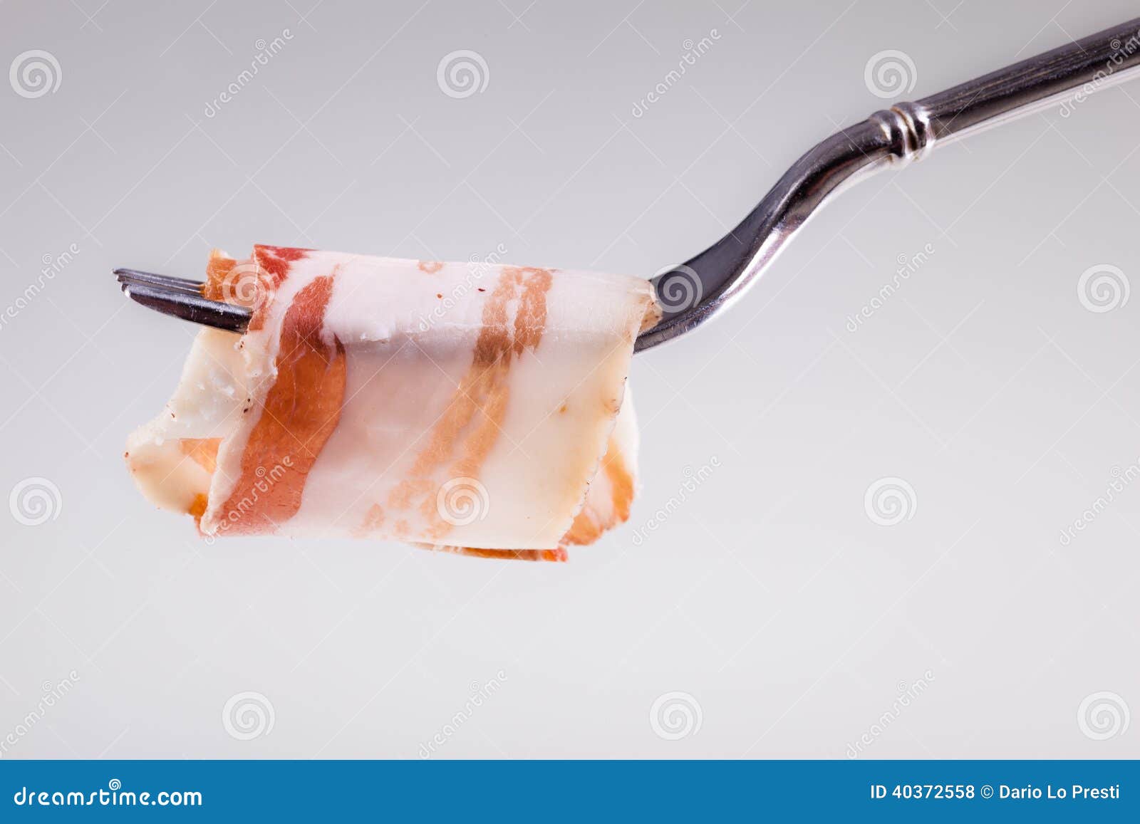 Bacon on fork stock photo. Image of close, meat, preserved - 40372558