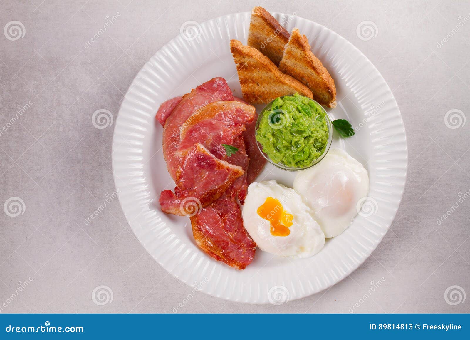 Bacon, Poached Eggs, Mashed Peas and Toasts on White Plate. Grilled ...