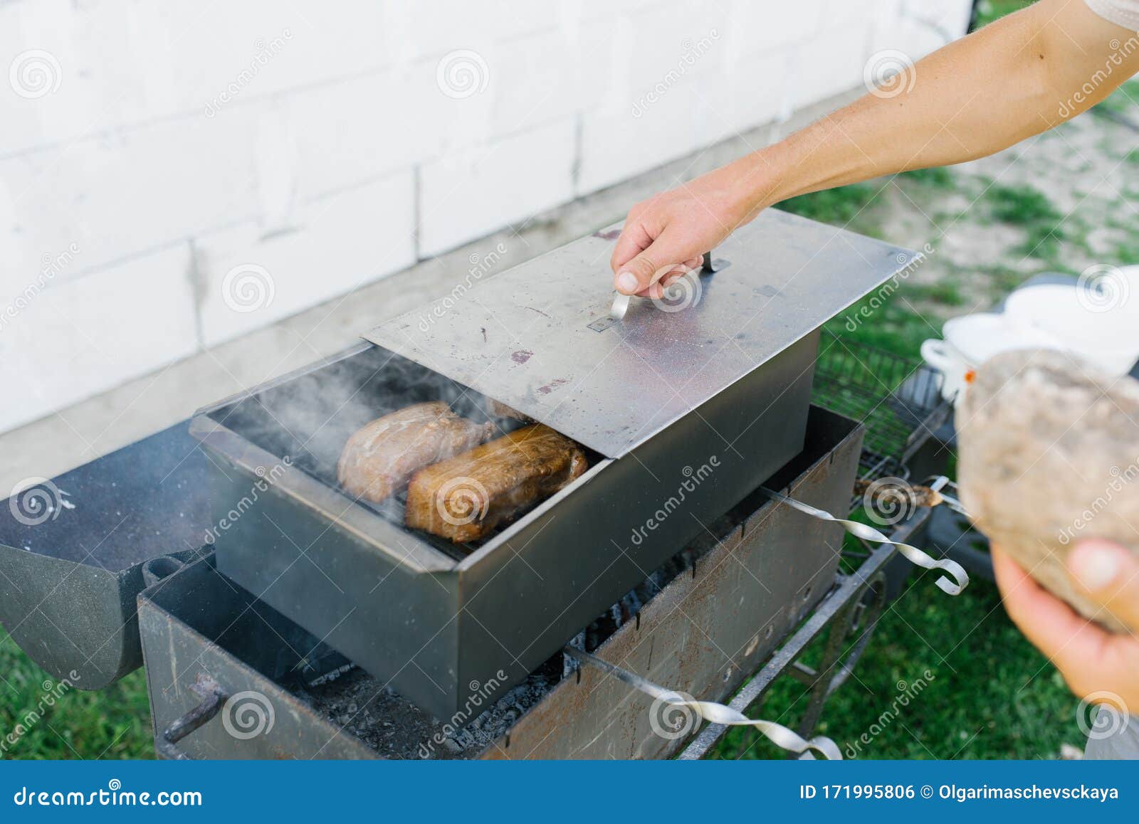 Hand Opens Fuse Box In A Residential House Looking At The Electrical ...