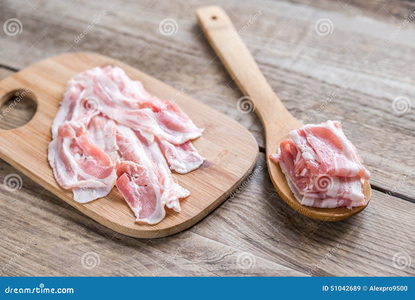 Bacon Strips on Wooden Spoon Stock Image - Image of folded, scoop: 51042689