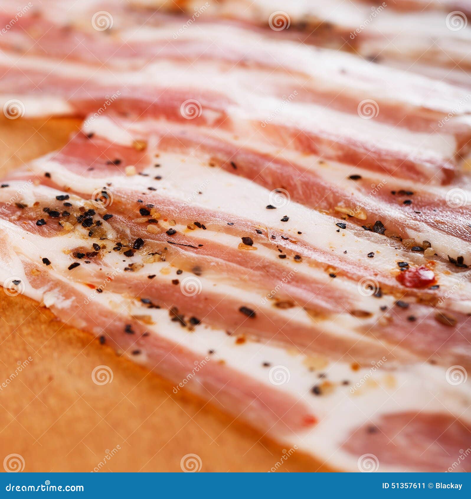 Bacon on wooden board stock image. Image of food, pepper - 51357611