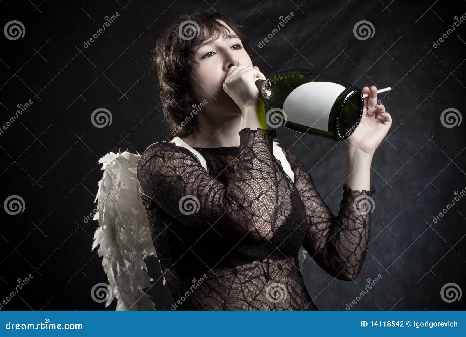 Bad angel stock photo. Image of nicotine, bottle, cigarette - 14118542