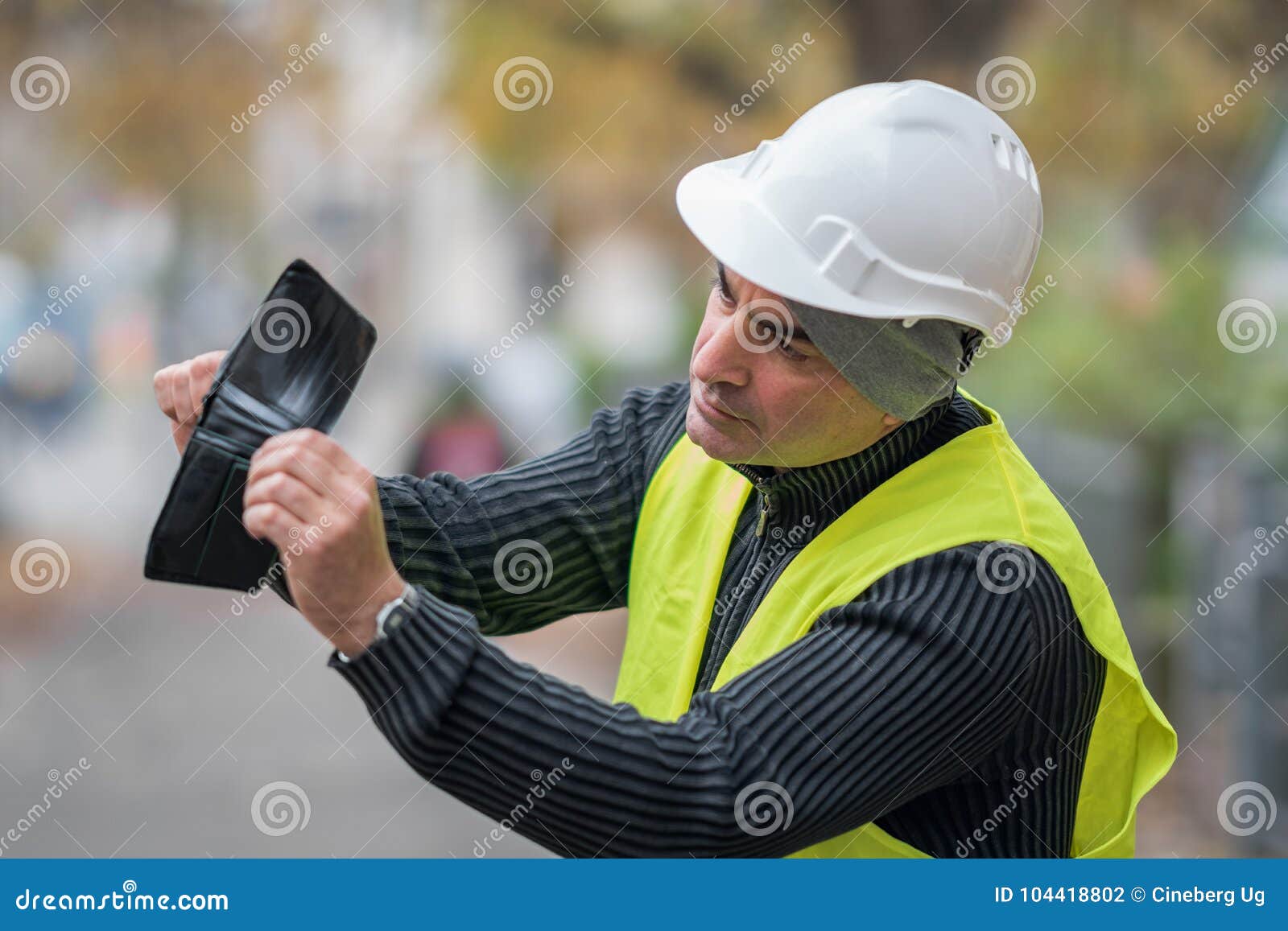 Bad Surprise: Poor Construction Worker and His Empty Wallet Stock Photo ...