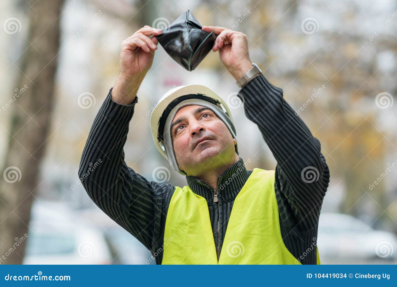 Bad Surprise: Poor Construction Worker and His Empty Wallet Stock Photo ...