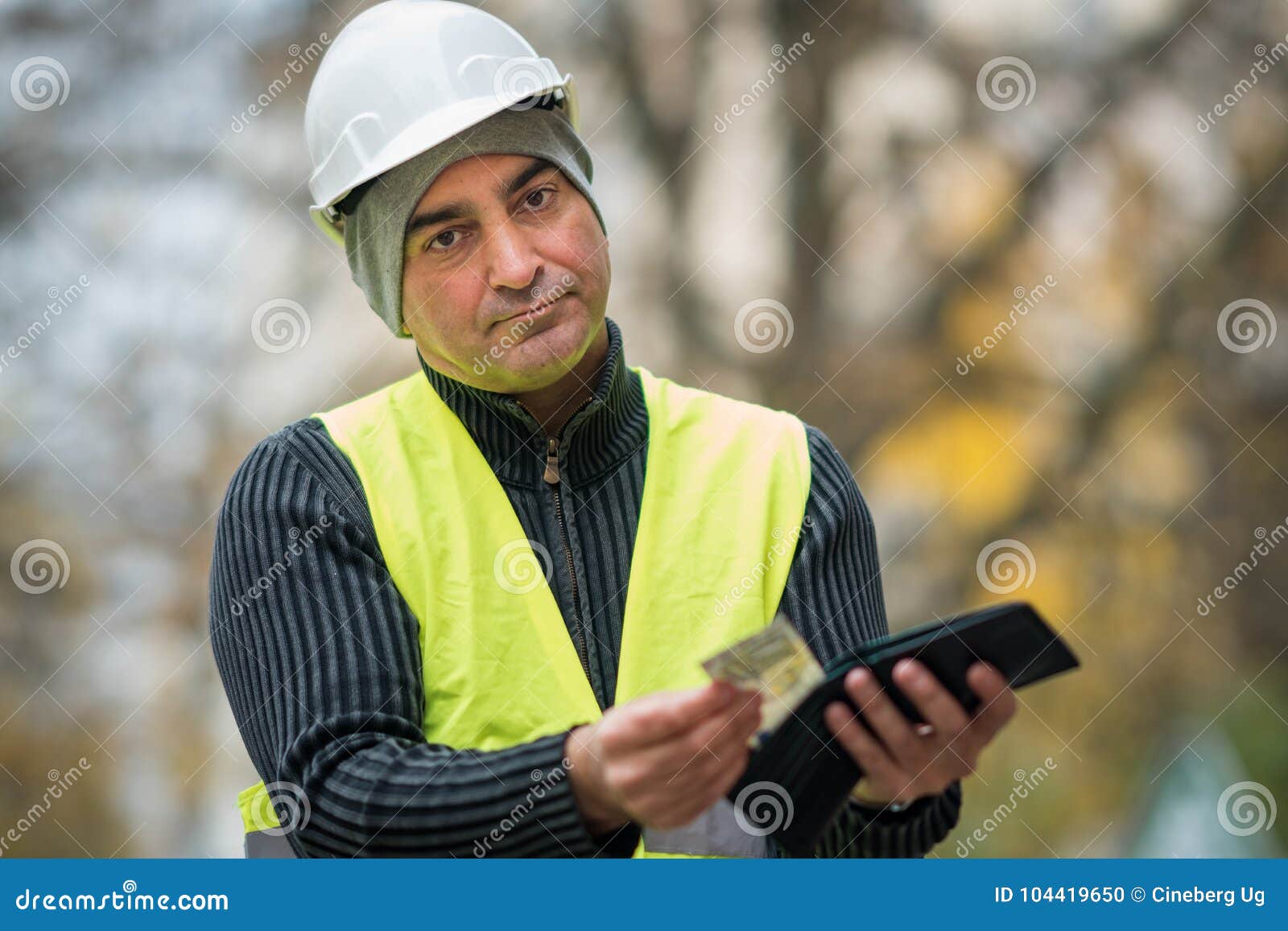 Bad Times: Poor Construction Worker and His Empty Wallet Stock Photo ...