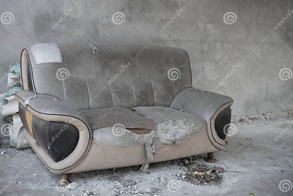 A Badly Damaged Sofa with Copy Space Stock Photo - Image of rubbish ...