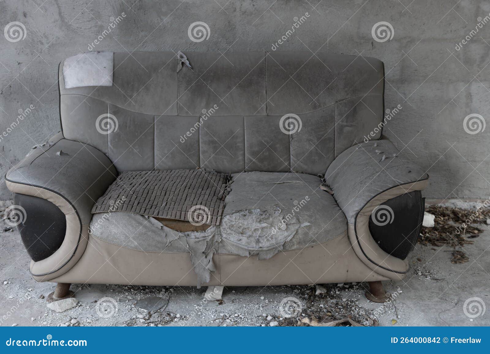 A Badly Damaged Sofa at Horizontal Composition Stock Photo - Image of ...