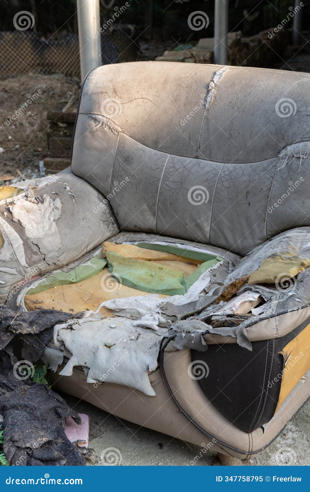 Badly Damaged Sofa on the Roadside at Vertical Composition Stock Image ...