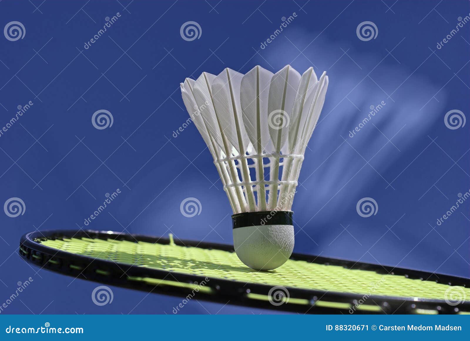 Badminton Ball Flies On A Racket On An Orange Background Stock Photo ...