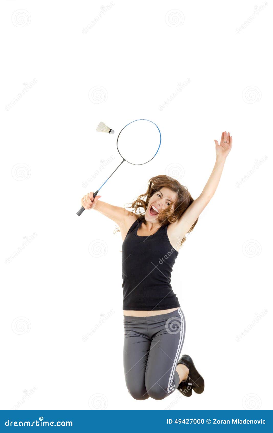 Badminton Player in Action Holding Racket To Catch Shuttlecock Stock ...