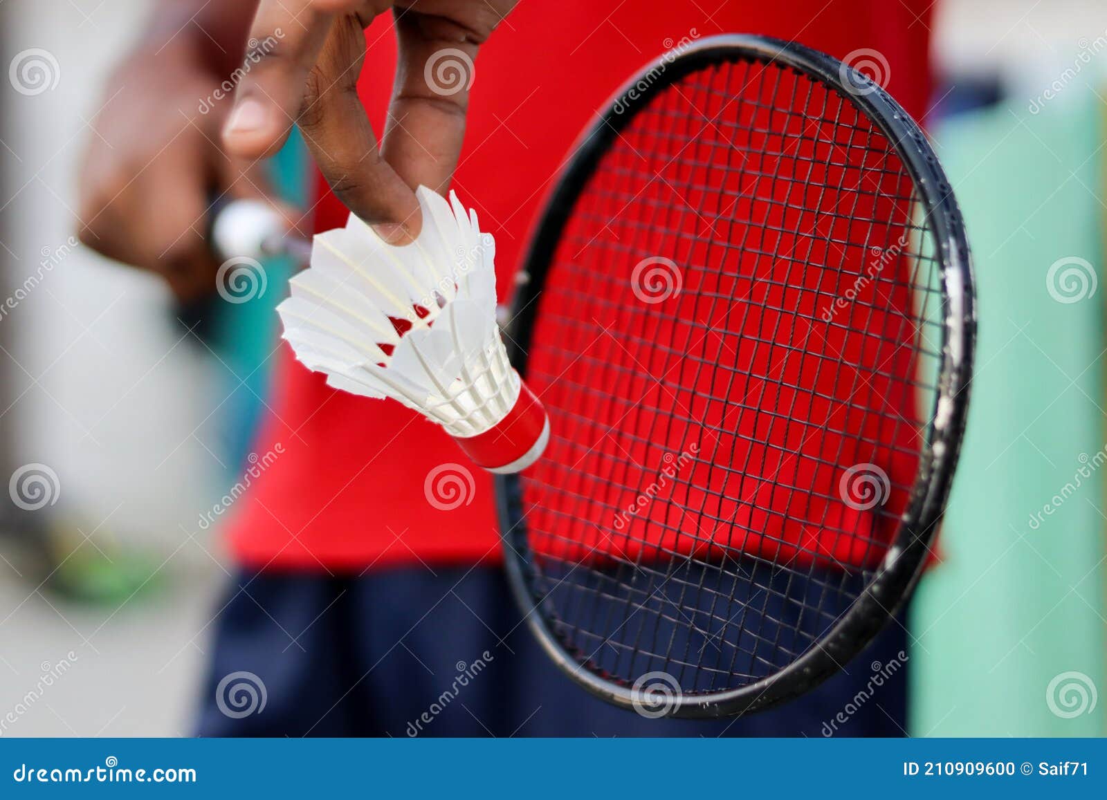 Badminton Player Holding Racket with Badminton Shuttlecock Stock Photo ...