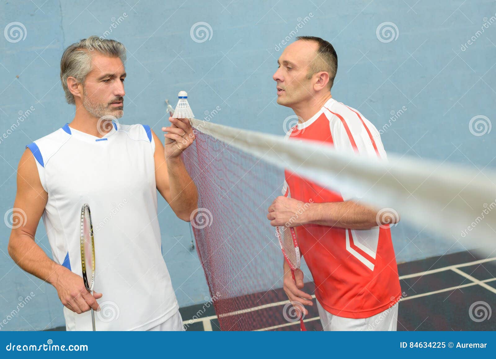 Badminton Players Holding Shuttlecock Stock Image - Image of singles ...