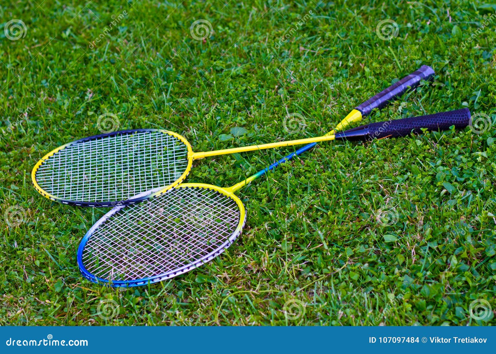 Badminton racket on grass stock photo. Image of enjoy - 107097484