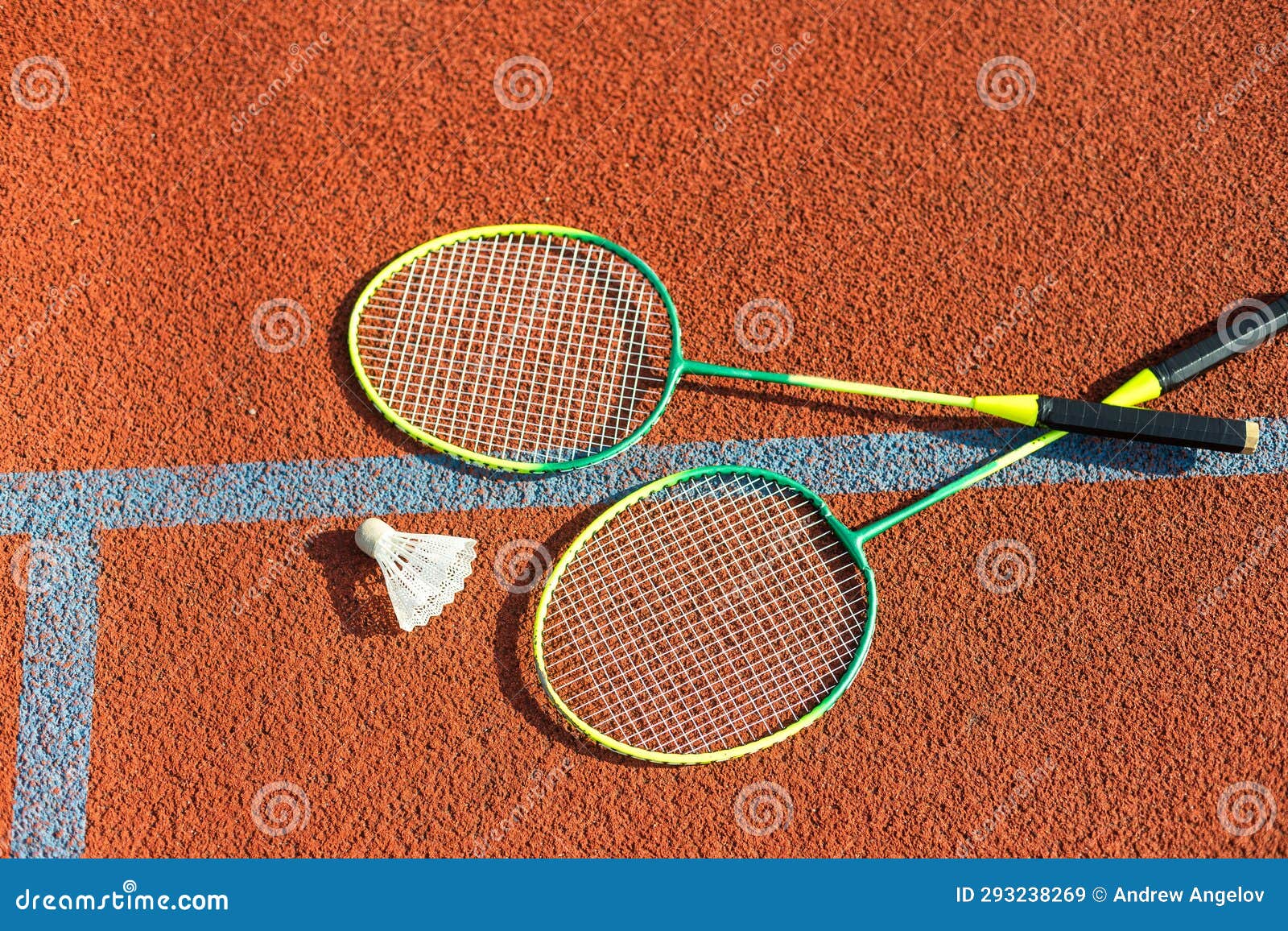 Badminton Rackets and Feather Shuttlecock on the Court Stock Image ...