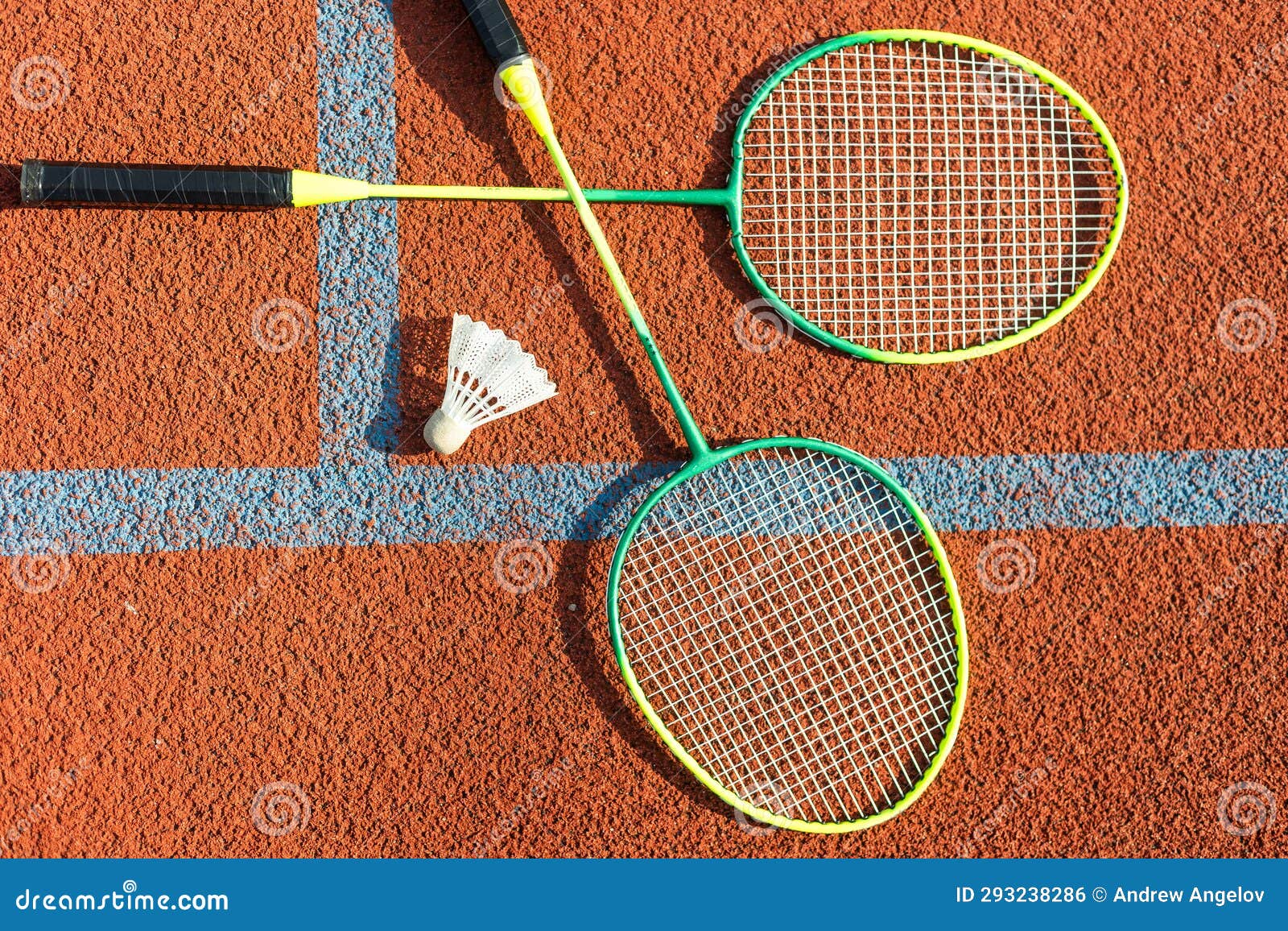 Badminton Rackets and Feather Shuttlecock on the Court Stock Photo ...