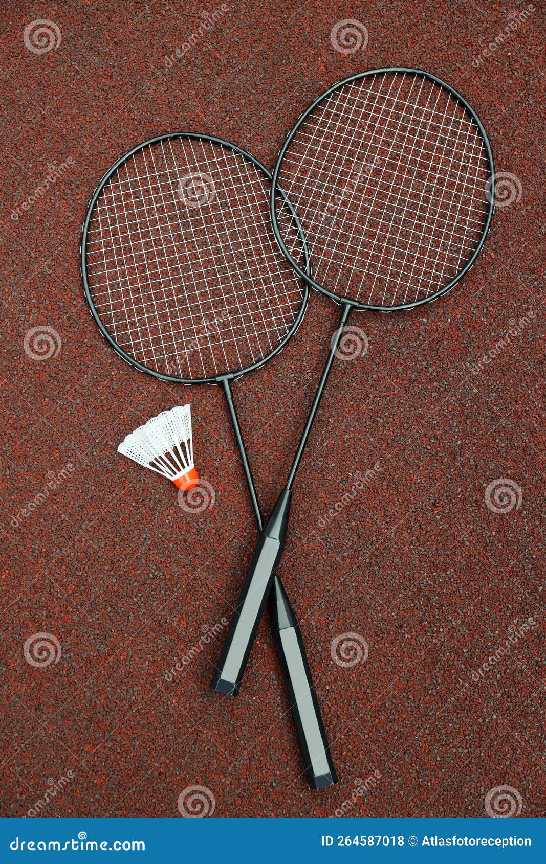 Badminton Rackets and Shuttlecock on Playground Rubber Coating Stock ...