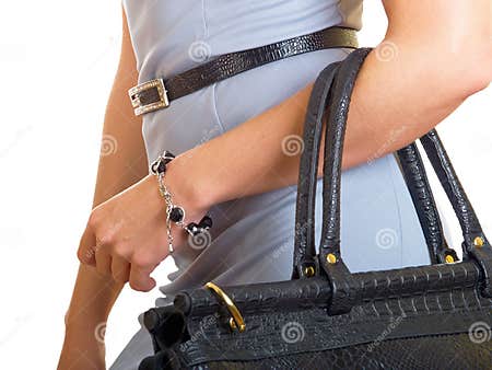 Bag on a female hand stock photo. Image of material, hand - 10841794