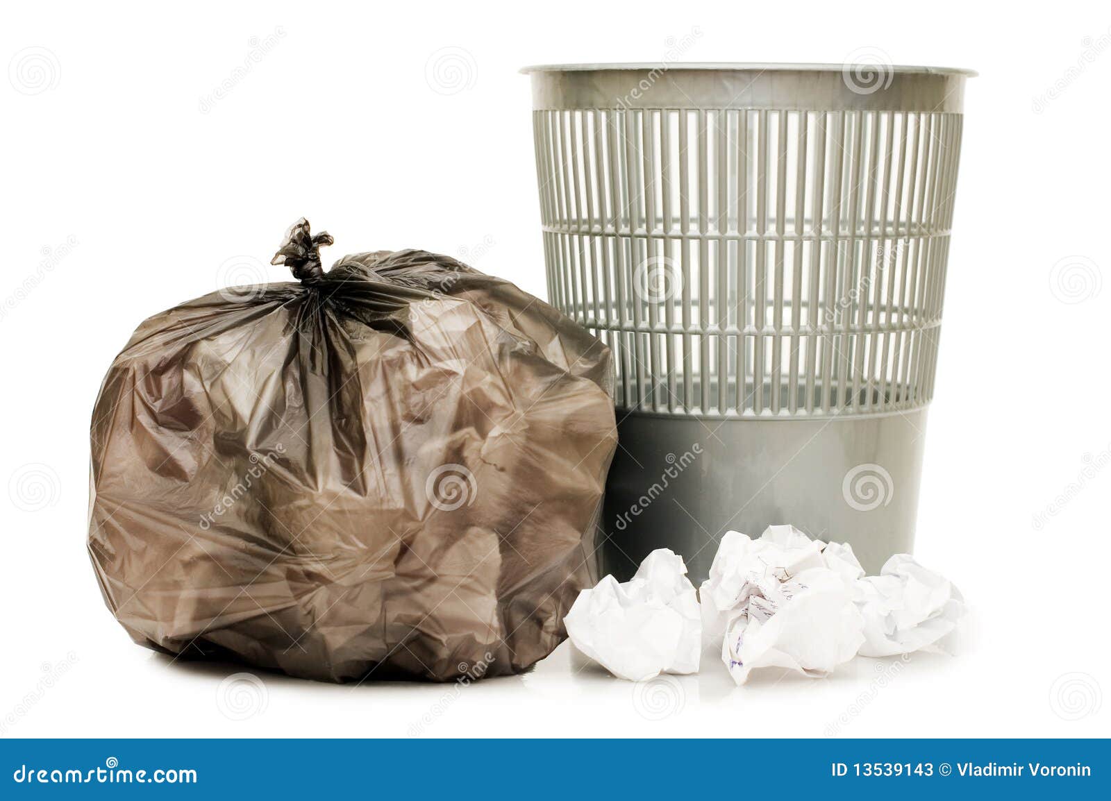 Red And Wet Garbage Basket In A Park On A Background Of Green Grass ...