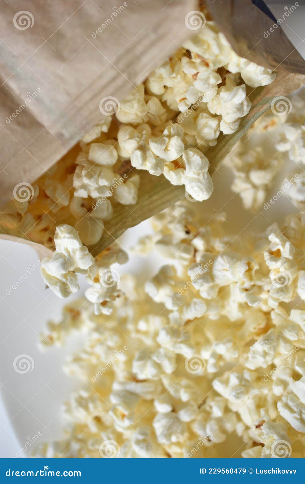 A Bag of Popcorn Open on a Plate in the Kitchen Stock Image - Image of ...