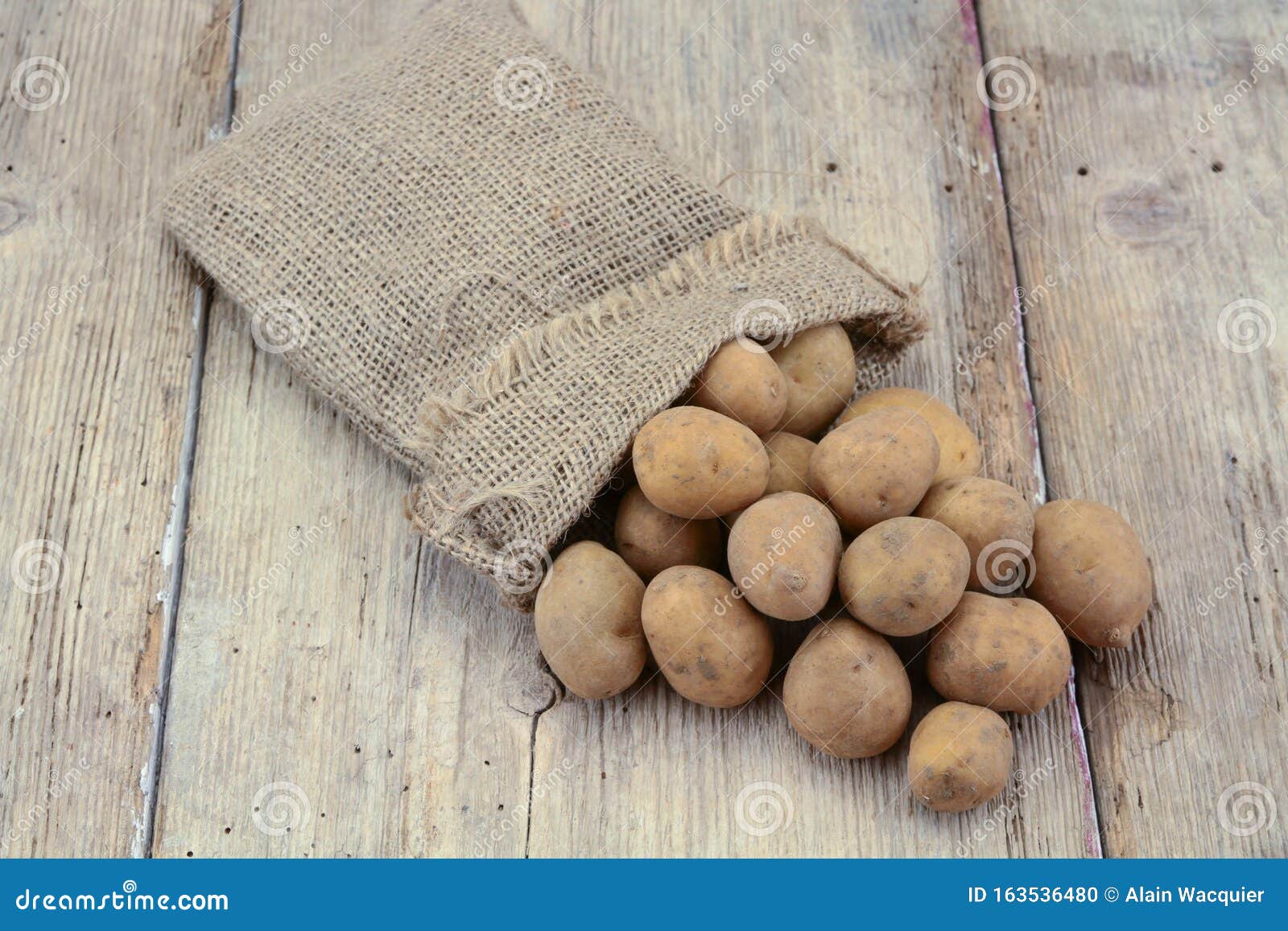 Bag of potatoes stock photo. Image of table, potato - 163536480