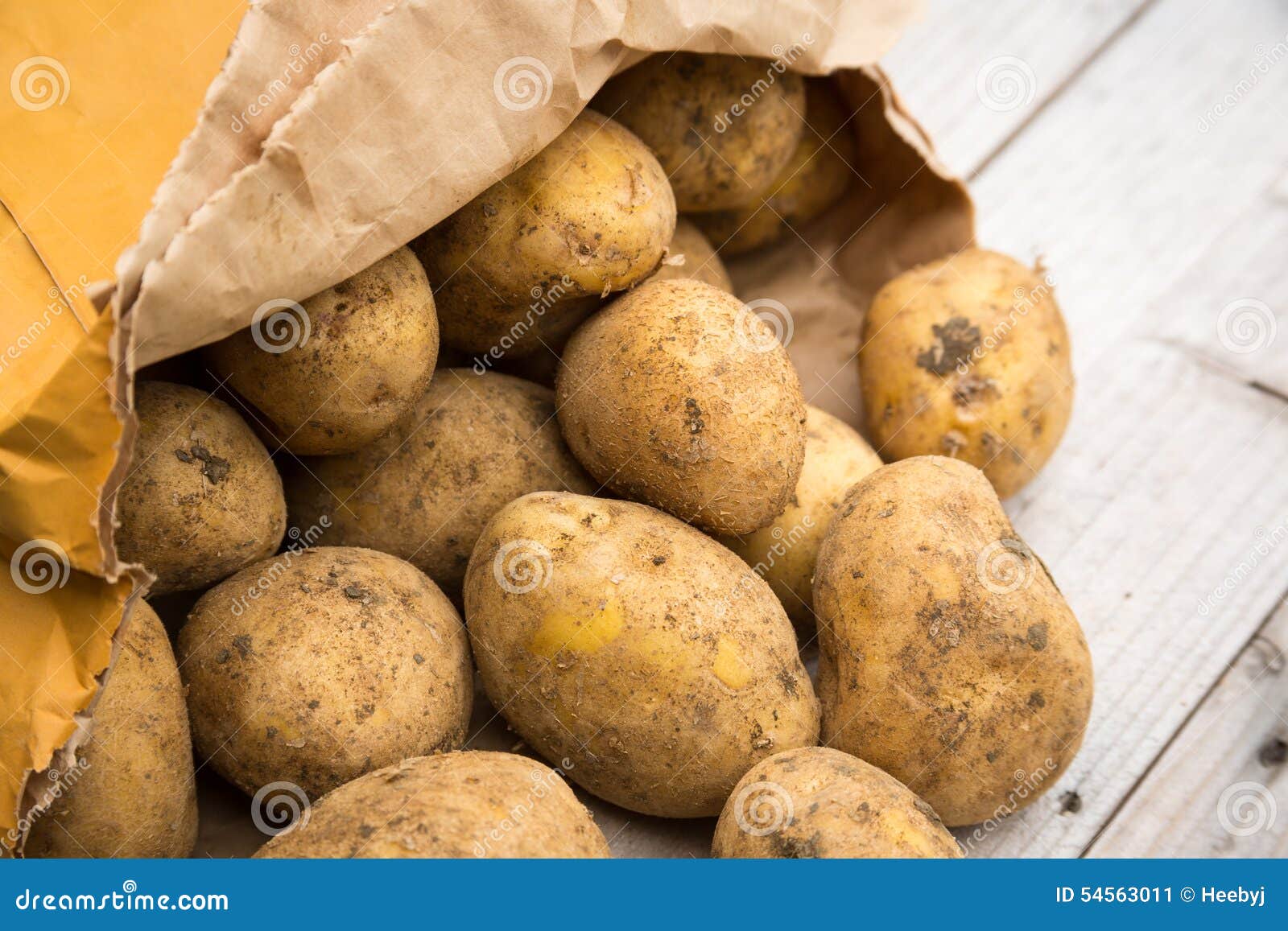 Bag of Potatoes stock image. Image of wood, spill, healthy - 54563011