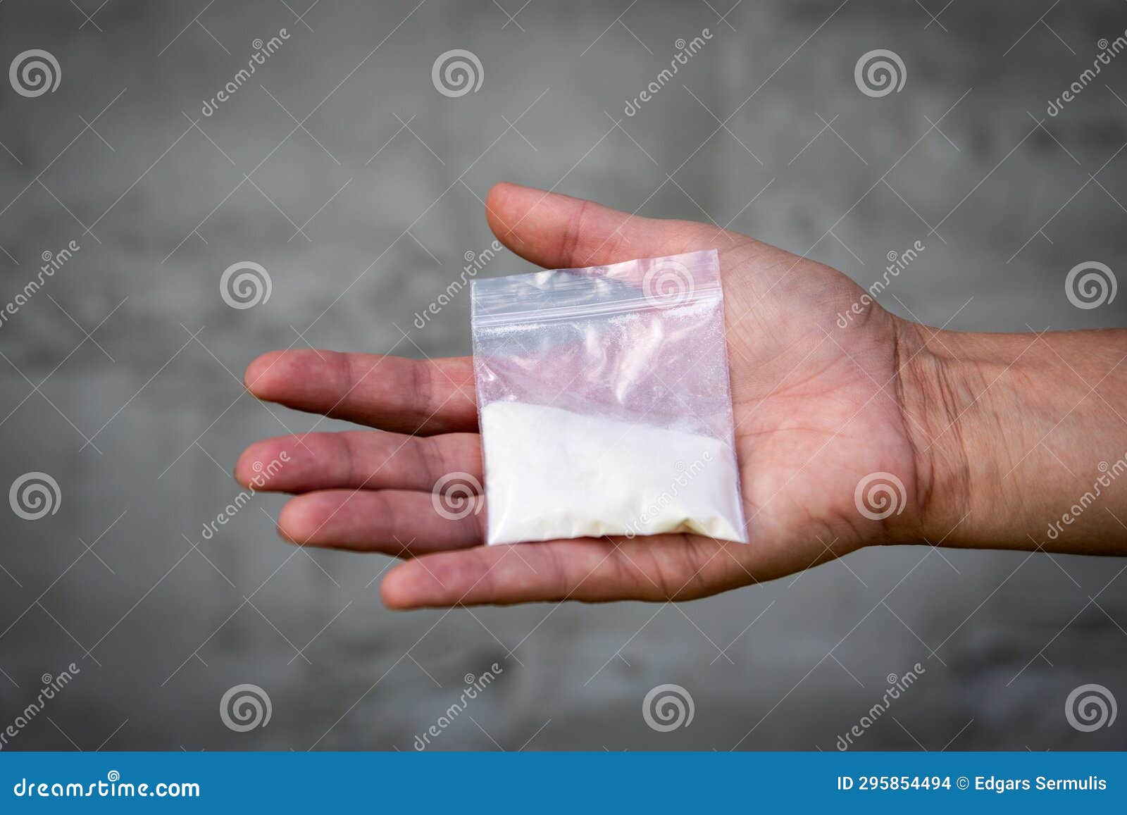 A Bag of White Powder in Hand. Image for Prohibited Substances ...